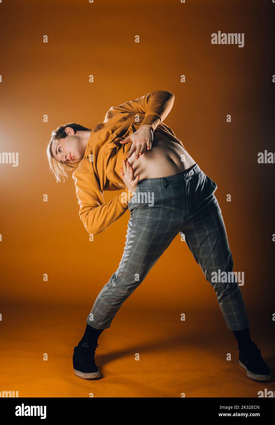 Athletic dancer performing an element of dance gymnastics Stock Photo ...