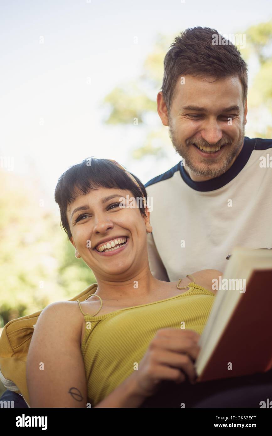 Cute couple relaxing reading hi-res stock photography and images - Alamy