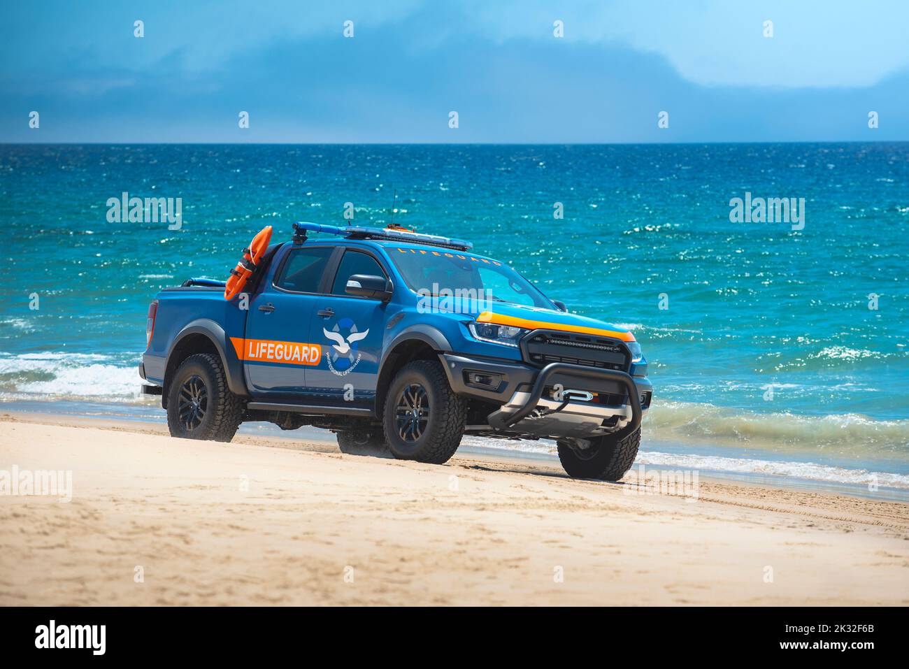 Lifeguard rescue car on the beach Stock Photo - Alamy
