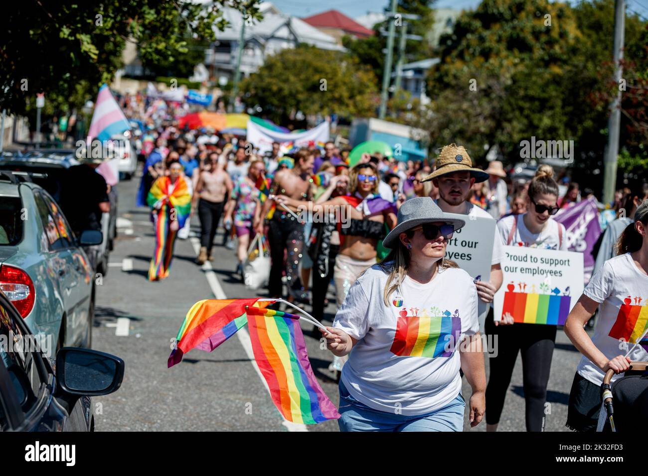 Brisbane, Australia. 24th Sep, 2022. A marcher seen carrying a flag ...