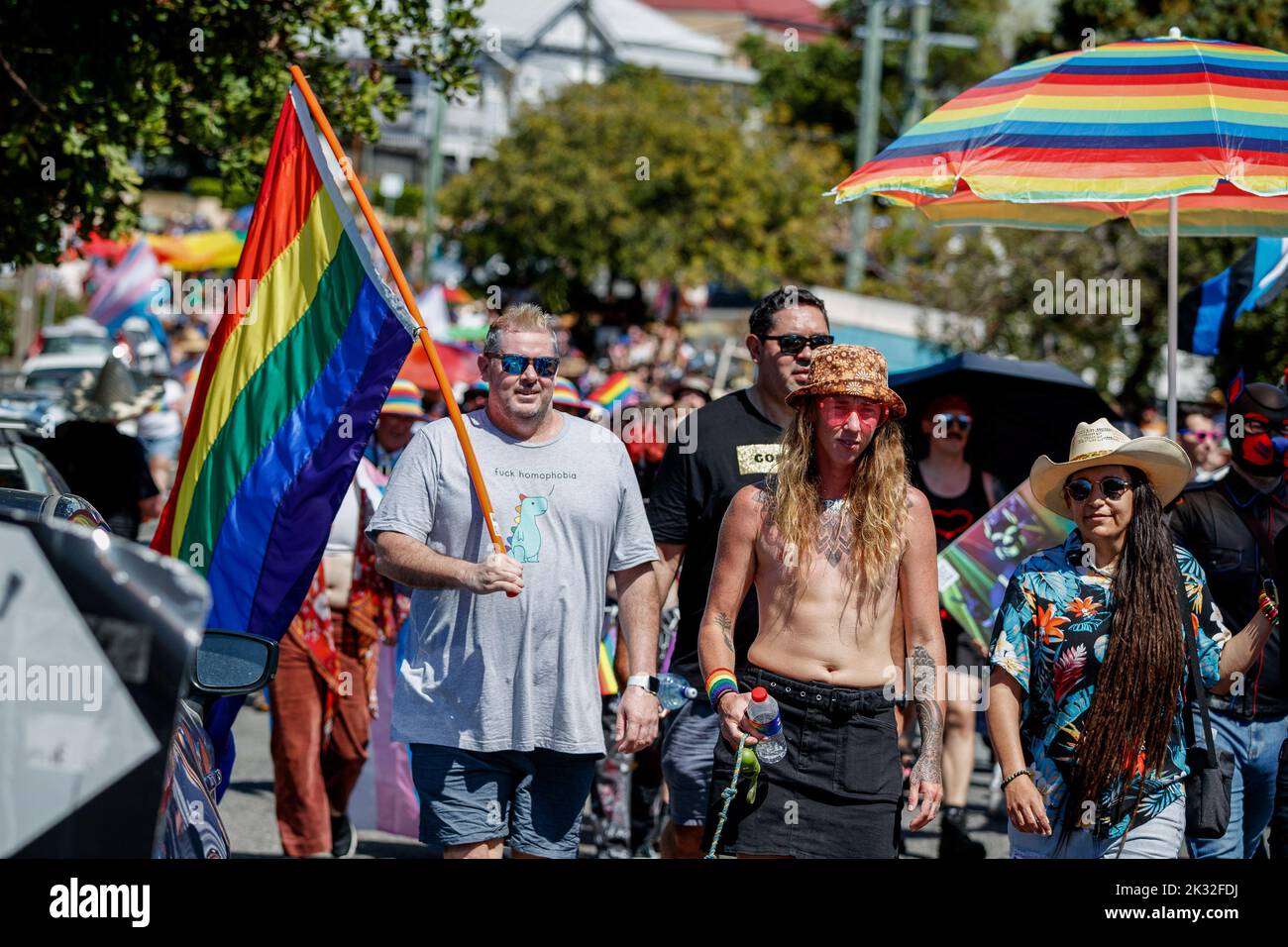 Brisbane, Australia. 24th Sep, 2022. A marcher seen carrying a flag ...