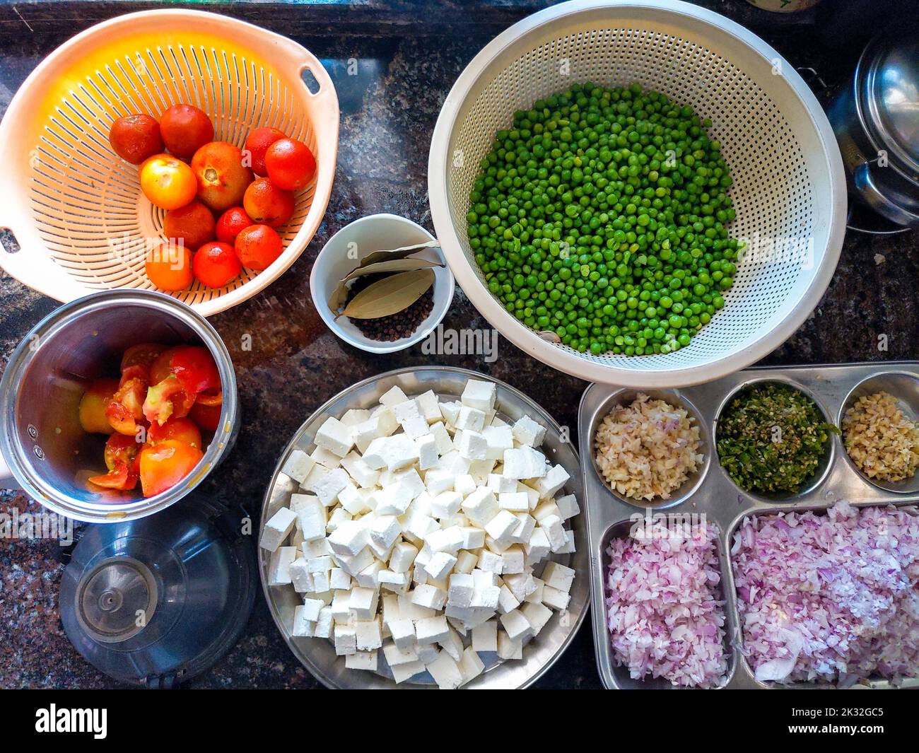 Chopped and sliced vegetables on kitchen counter. Preparation for ...