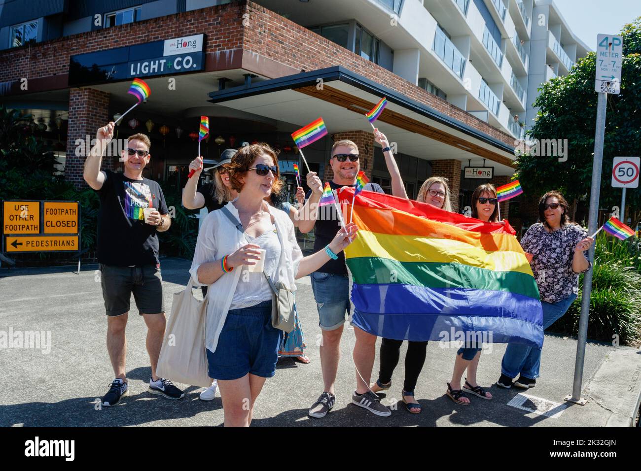 Brisbane, Australia. 24th Sep, 2022. Marchers seen carrying small flags ...