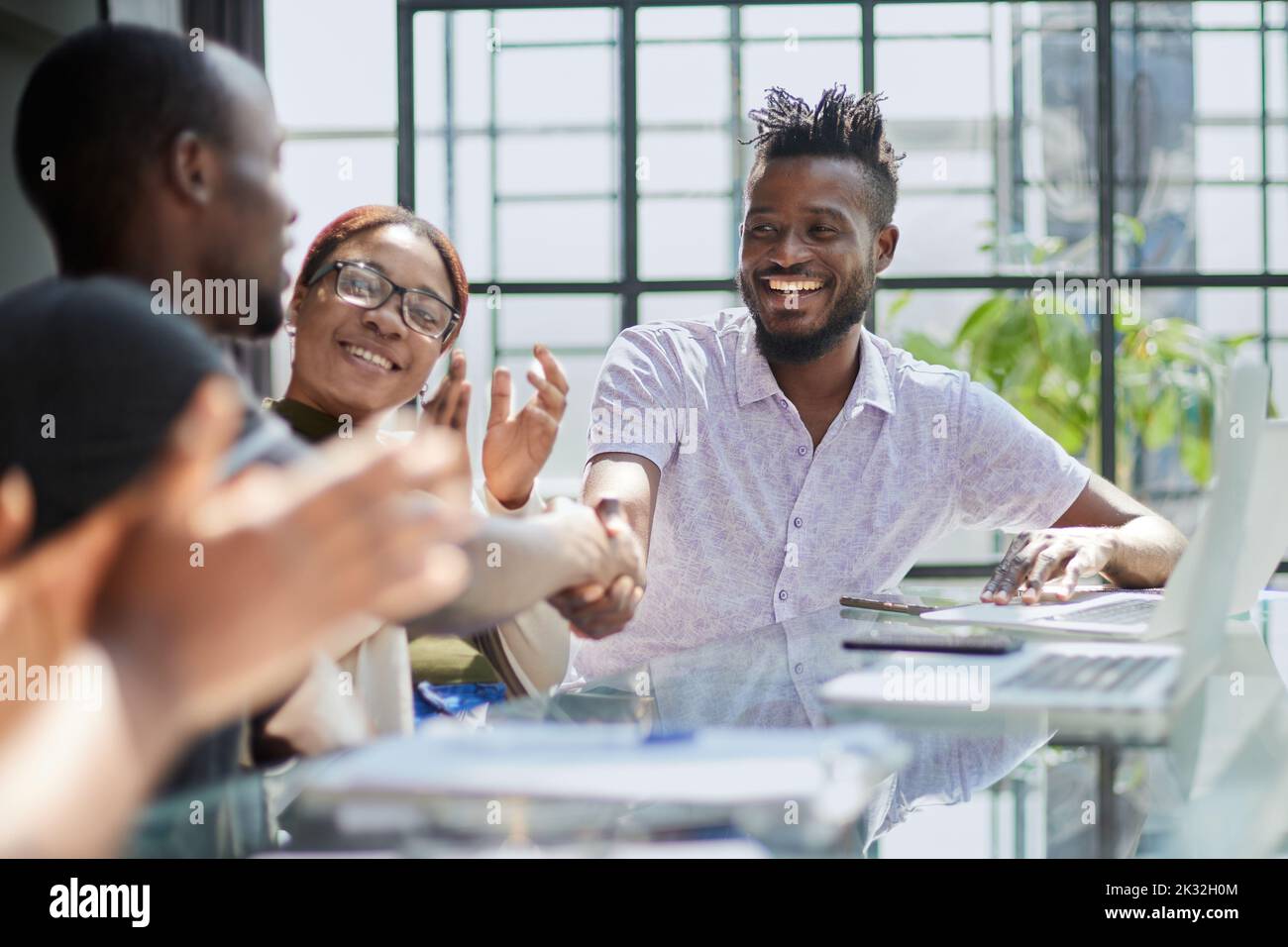african business people handshake at modern office Stock Photo - Alamy