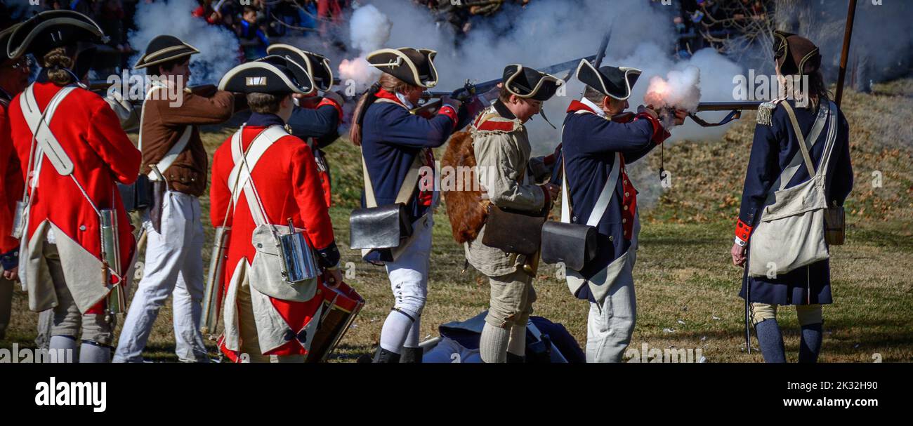 A group of soldiers' rear view during revolutionary war Reenactment in ...