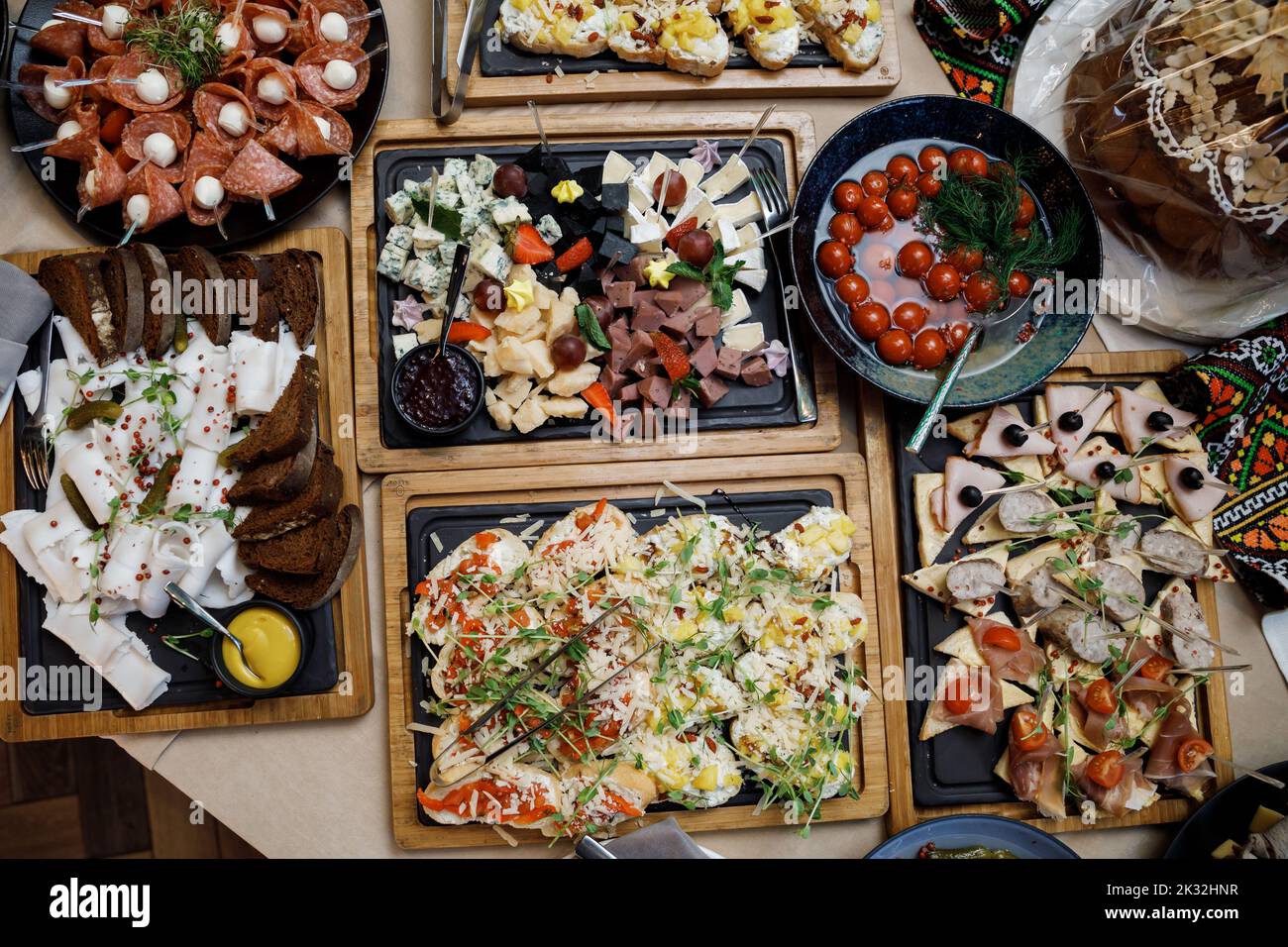 Buffet table with food and snacks for the guests of the event. Service ...