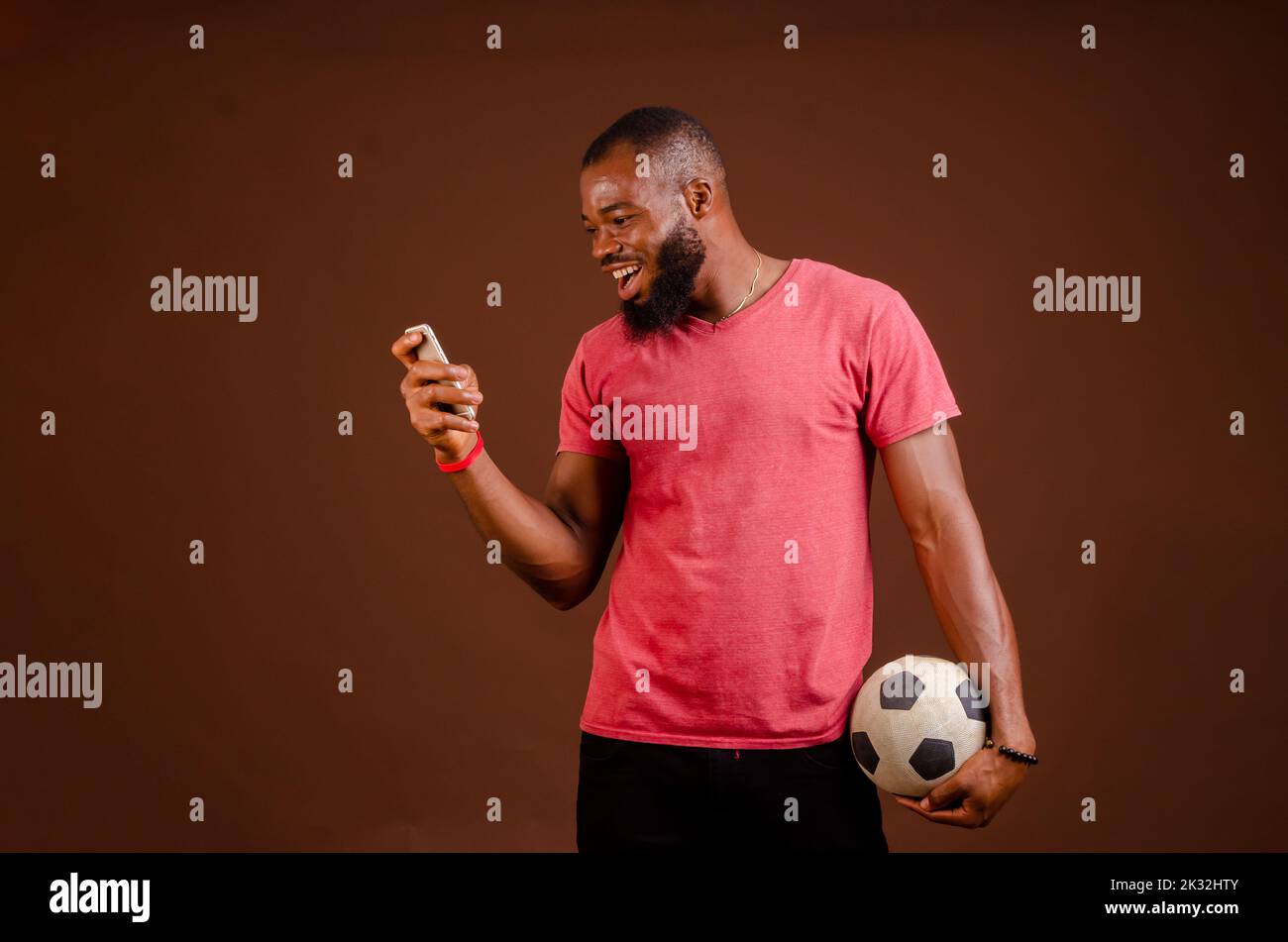 Football fan using mobile phone hi-res stock photography and images - Alamy