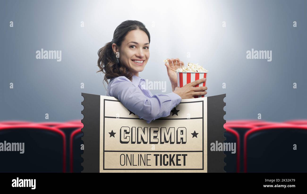 Woman movie theatre looking at camera hi-res stock photography and ...