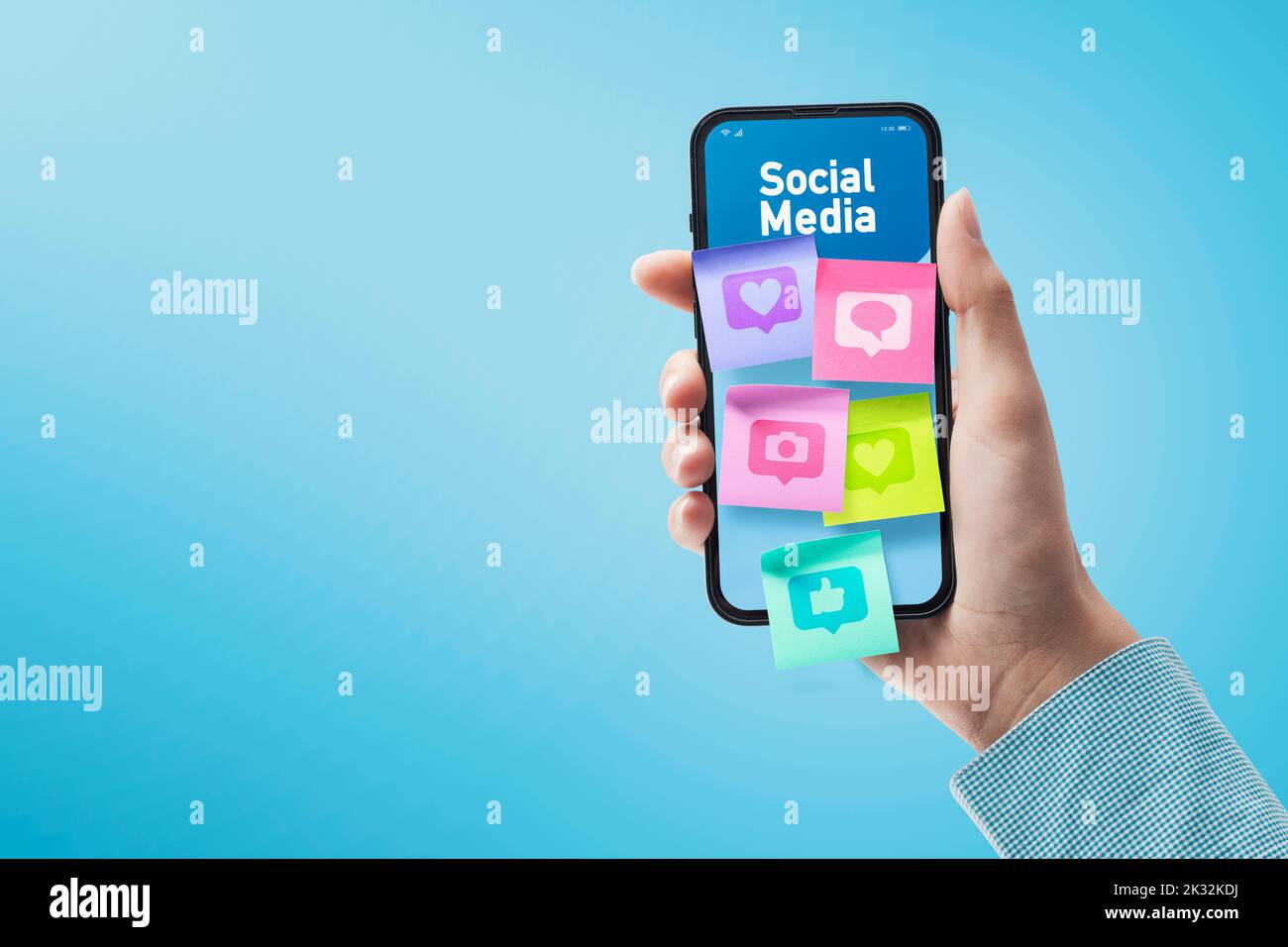 Woman connecting with social media online: sticky notes with icons on ...