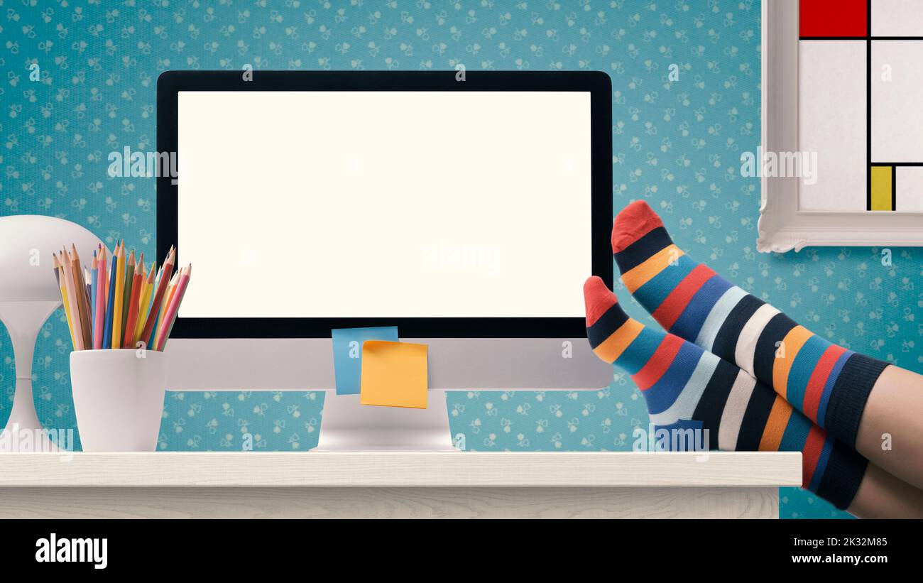 Feet up on desk hi-res stock photography and images - Alamy