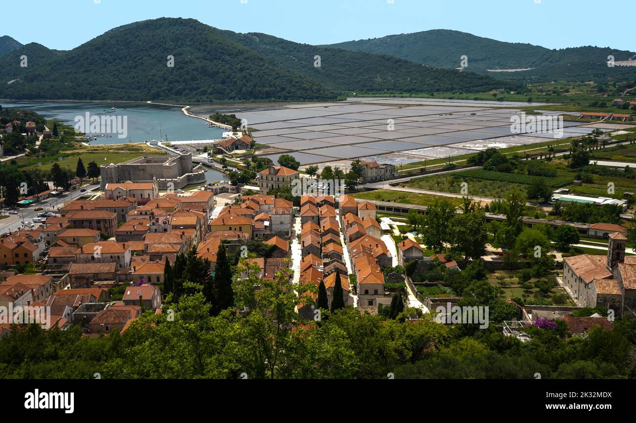 View of Ston town with salt fields and its defensive walls, Peljesac ...