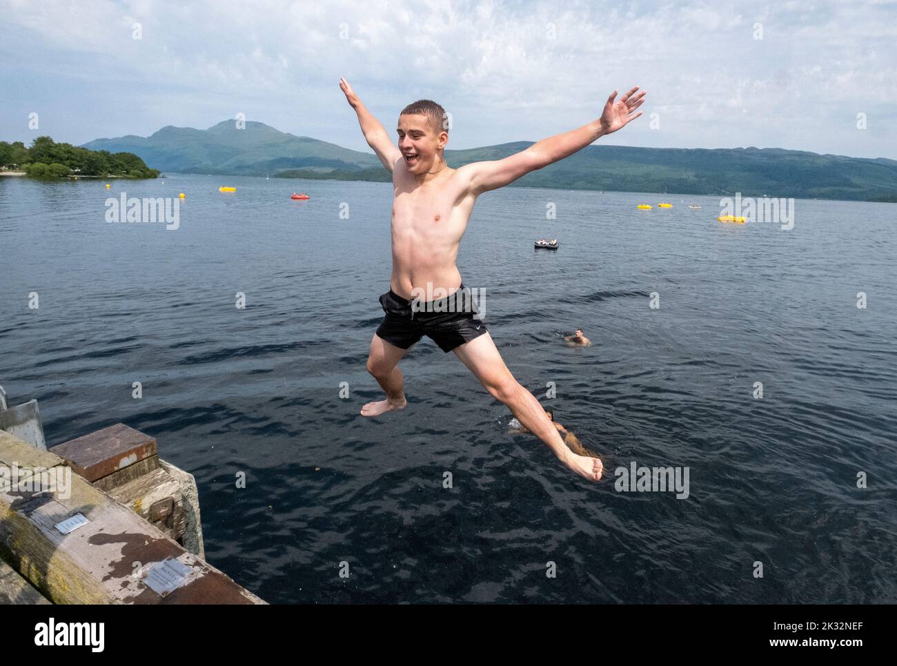 People enjoy the summer outdoors at Luss on Loch Lomond, Scotland ...