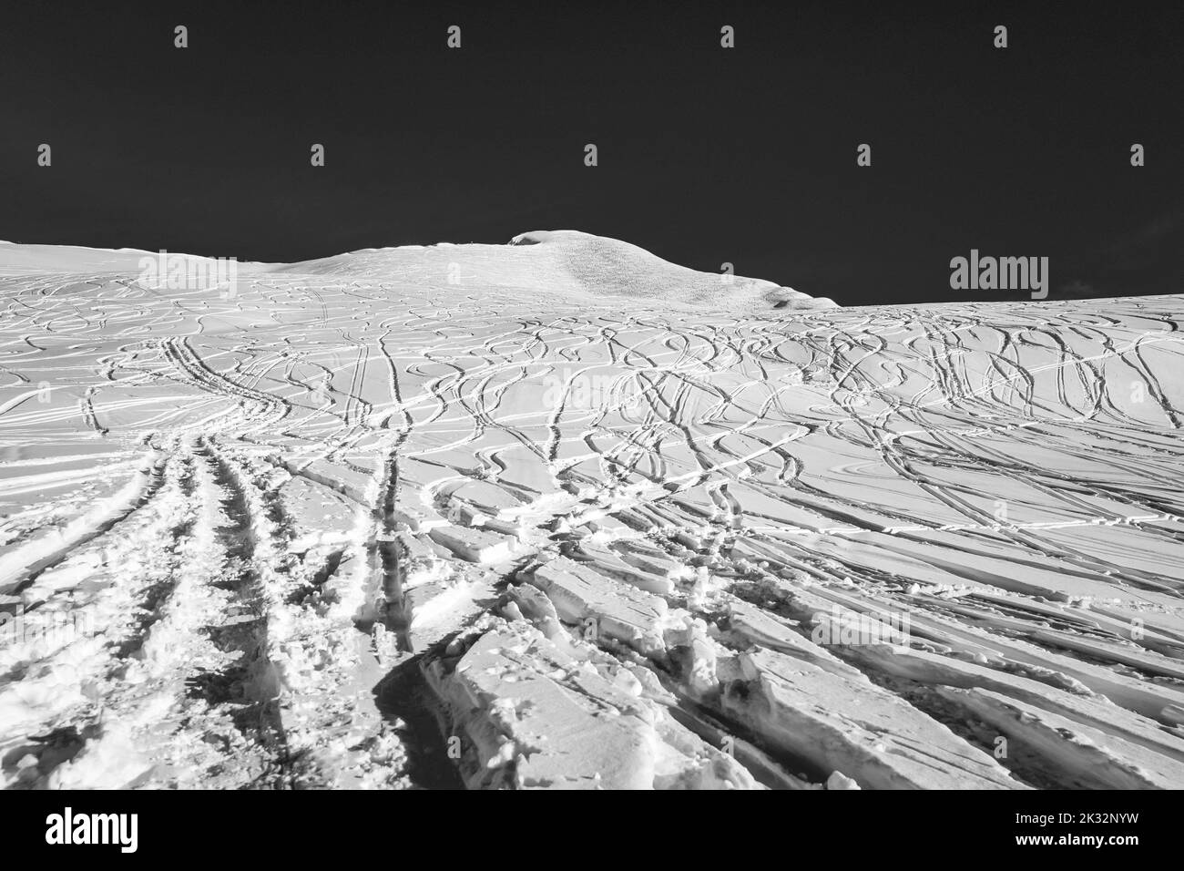 A minimalistic beautiful grayscale background of a snowy hillside with ...