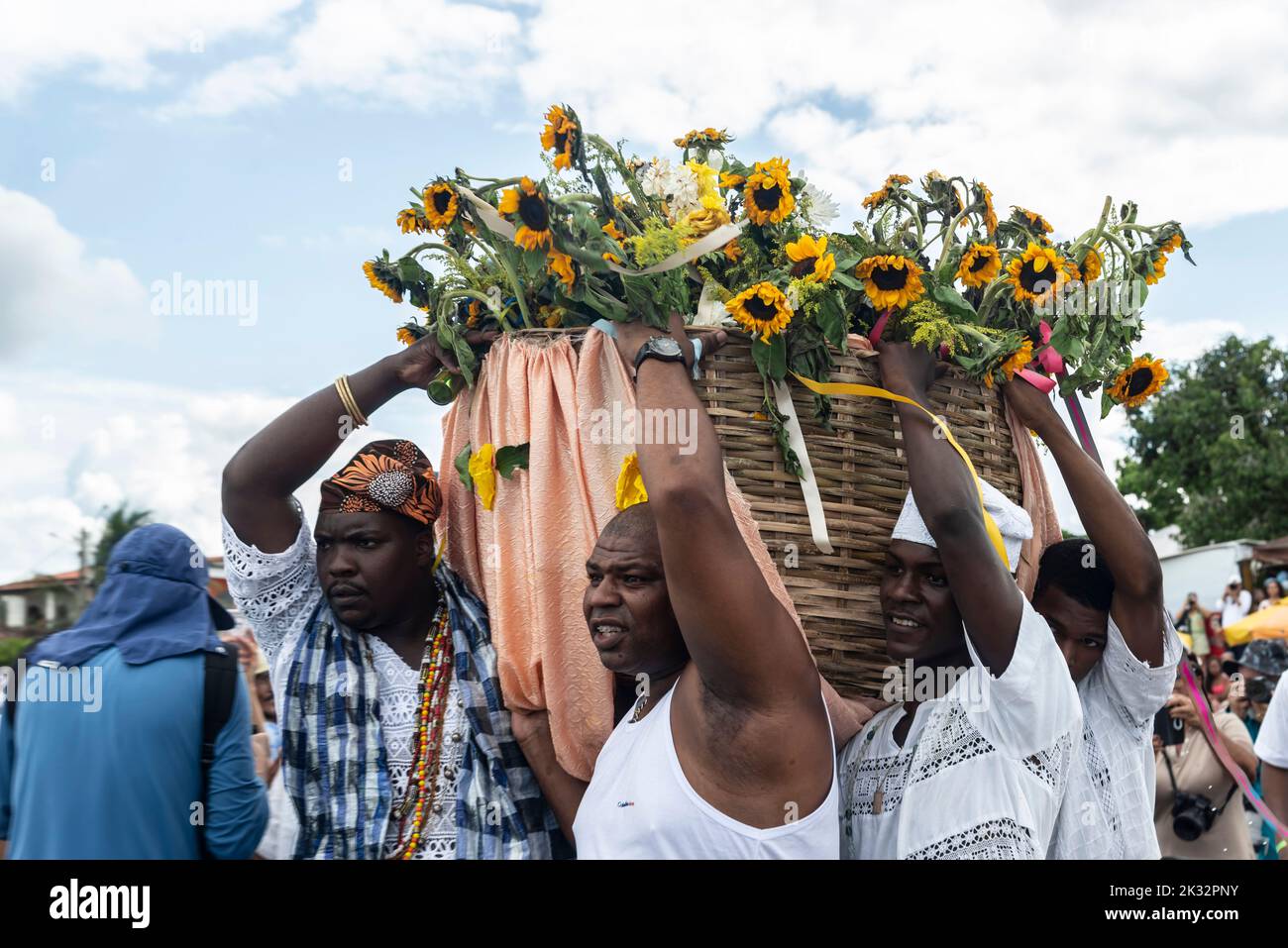 The Candomble members during a celebration in the waters of Santo Amaro ...