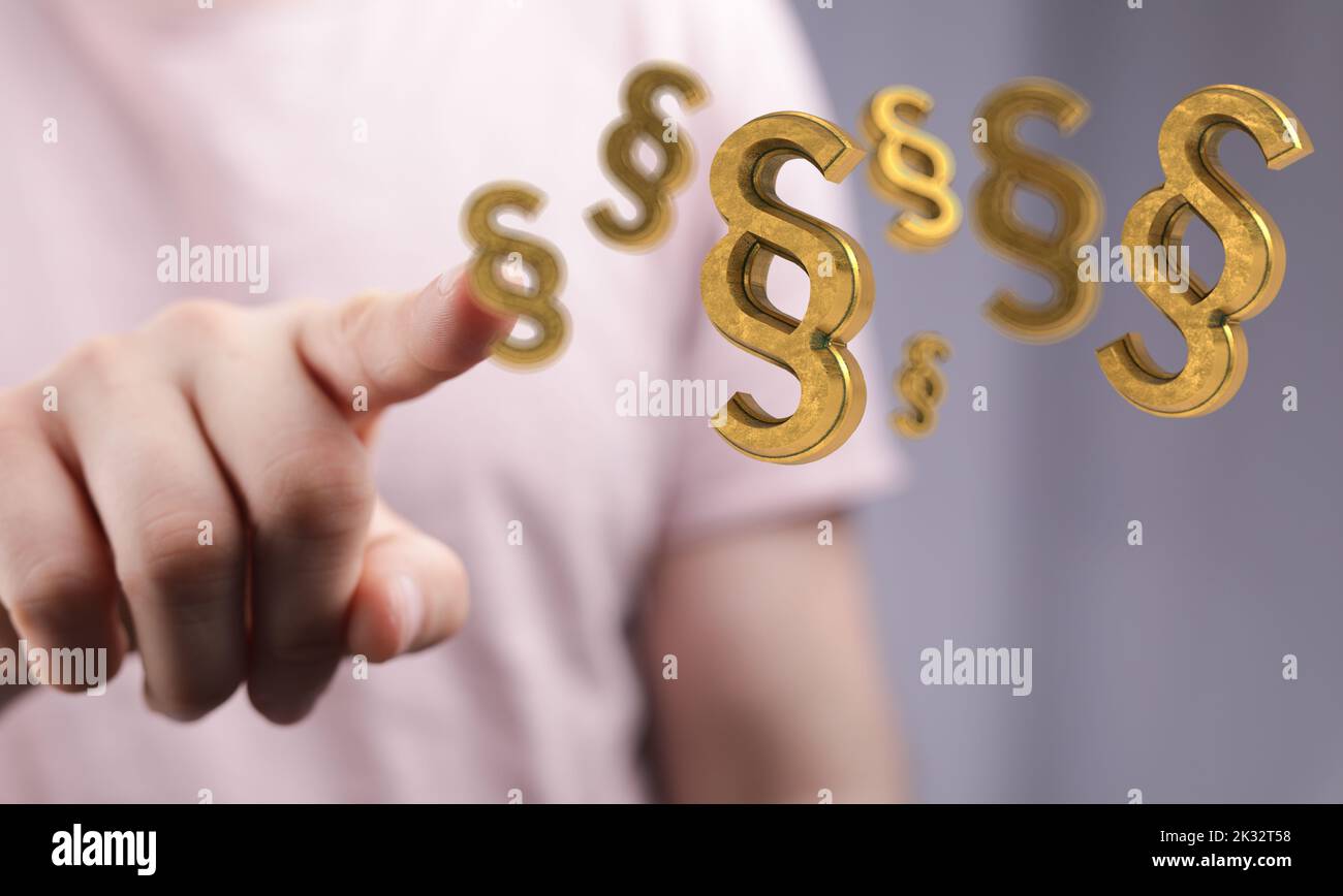The male man holding the paragraph symbols with his fingers ...