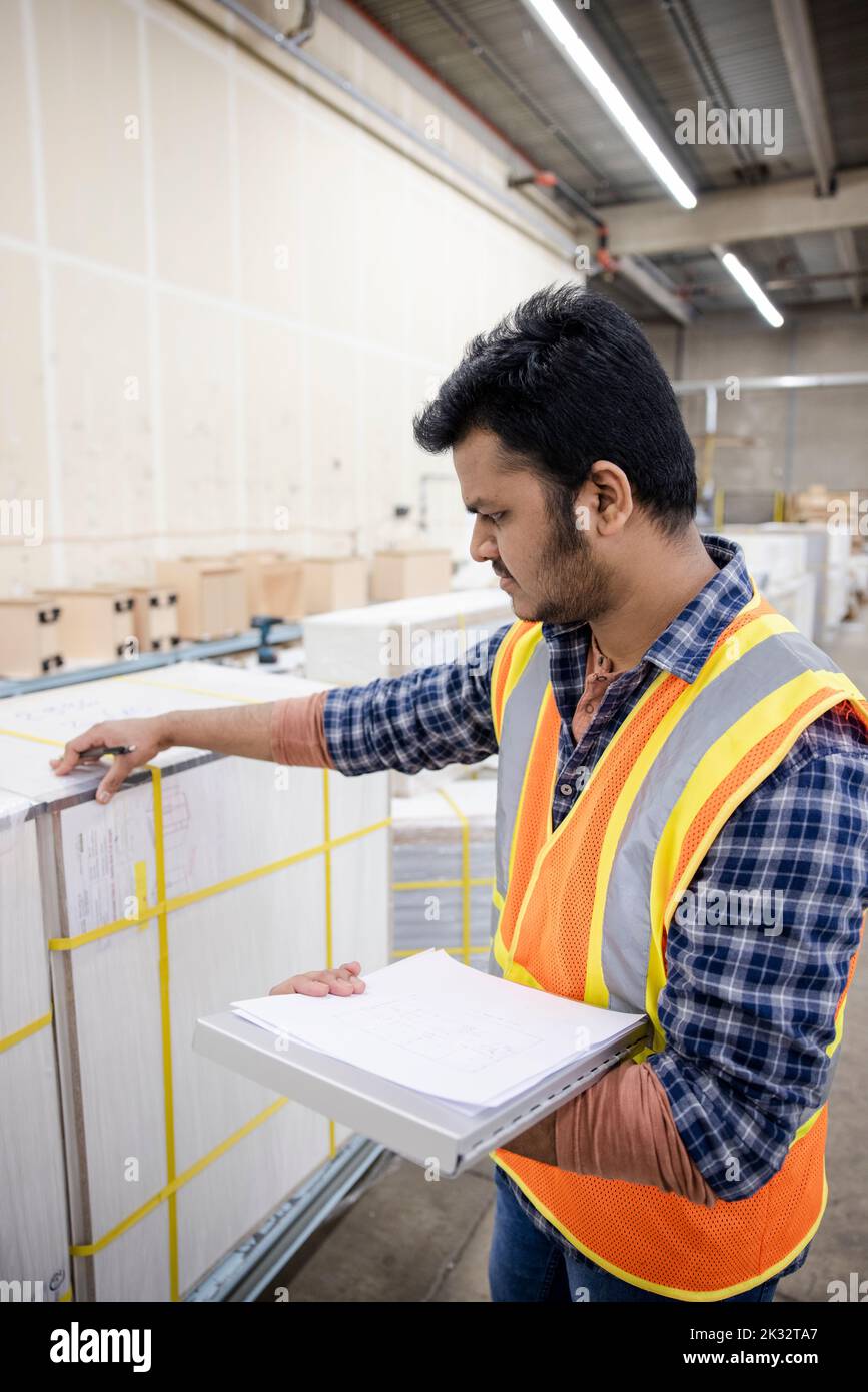 Checking details hi-res stock photography and images - Alamy