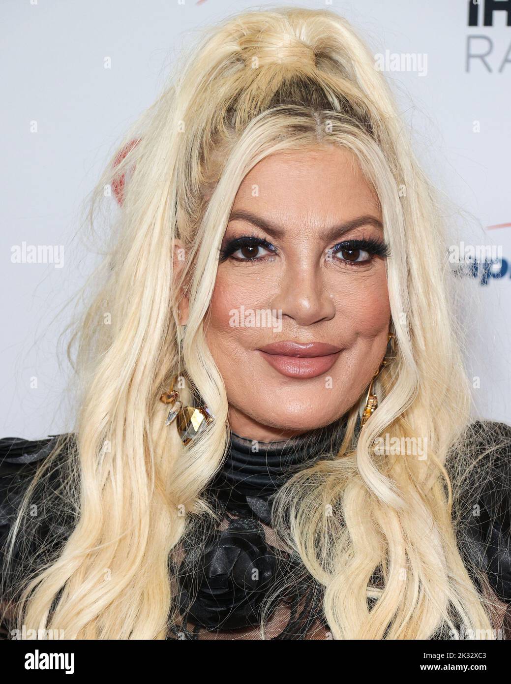 LAS VEGAS, NEVADA, USA - SEPTEMBER 23: Tori Spelling poses in the press ...