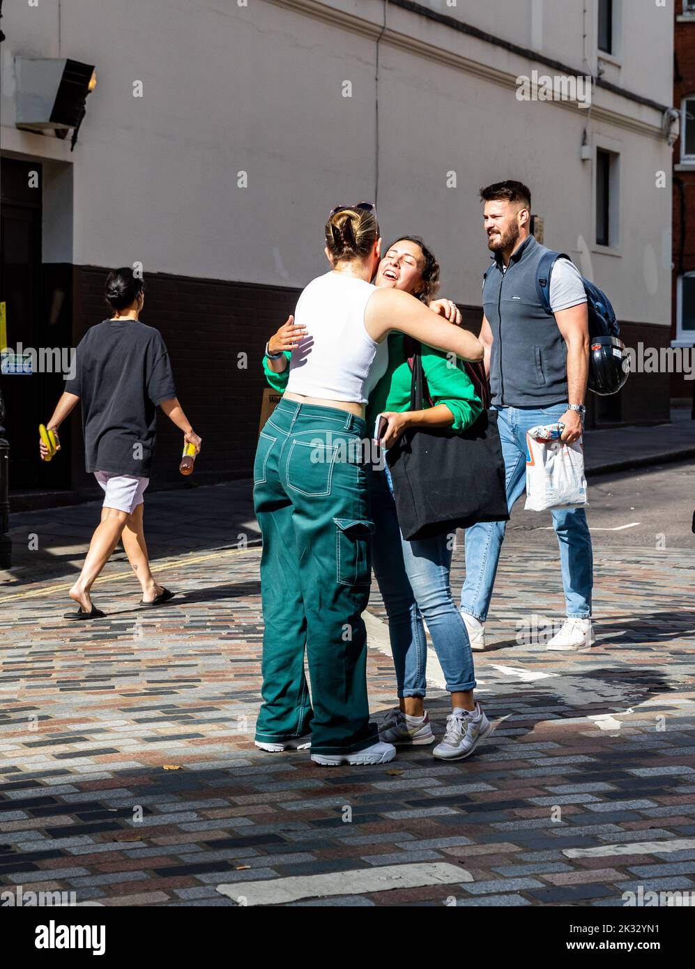 People hugging in London, UK Stock Photo - Alamy