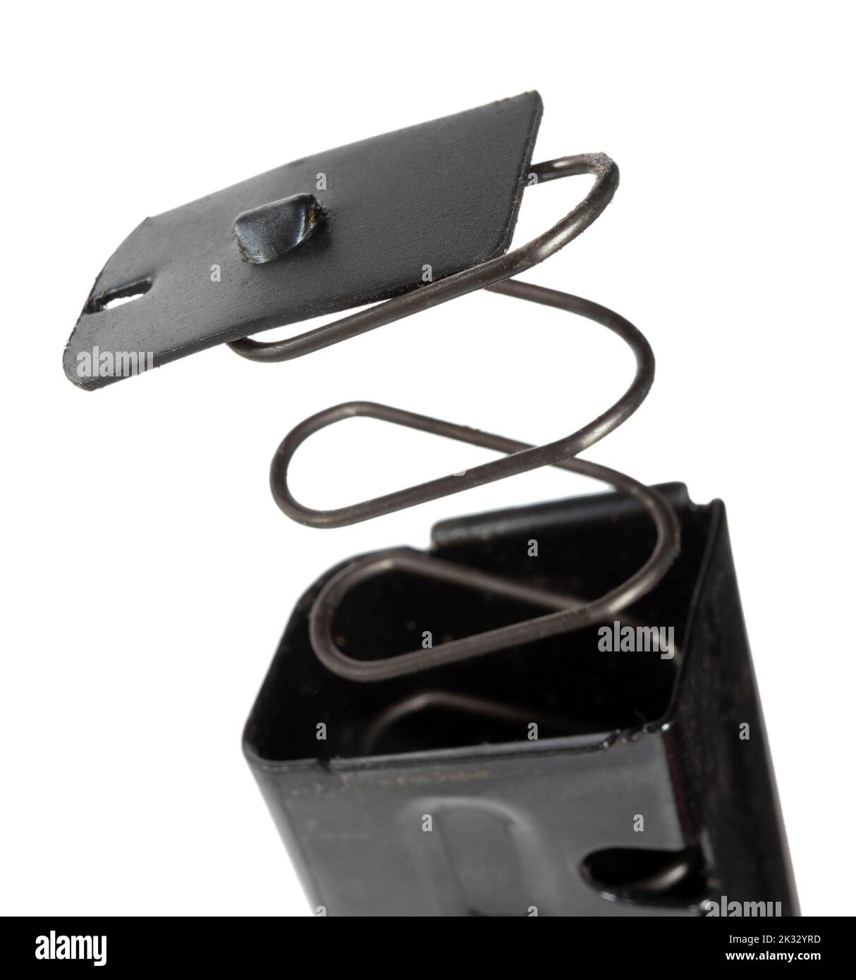 semi-auto pistol magazine and spring coming out isolated on white Stock ...