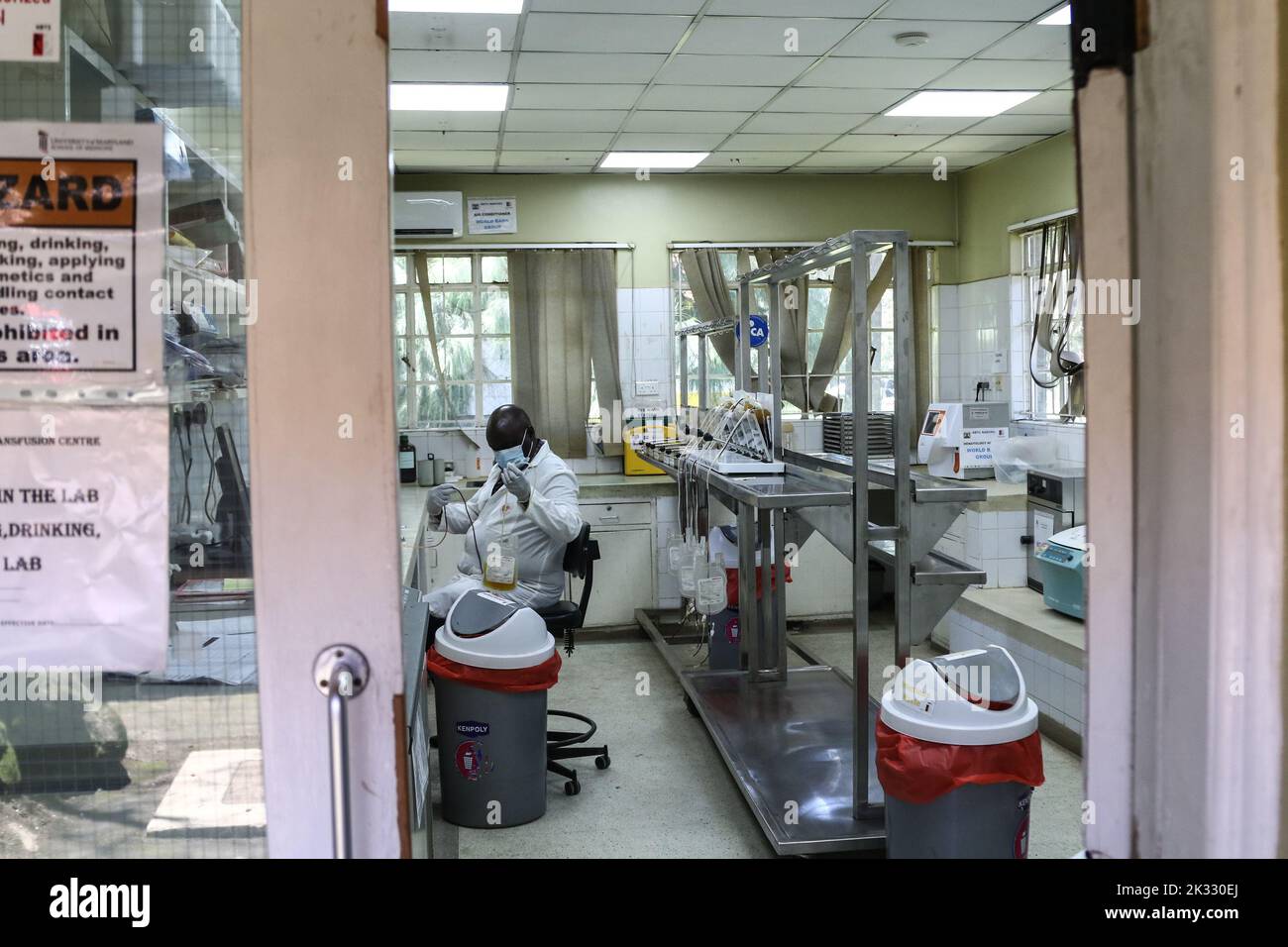 A laboratory technologist seen processing blood at Nakuru Regional ...