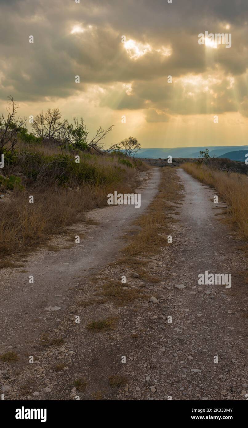Rain storm approaching a gravel road in Texas Hill Country Stock Photo ...