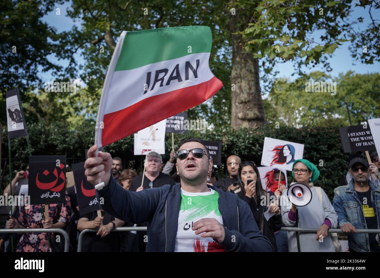 London, UK. 24th September, 2022. British-Iranians gather opposite the ...