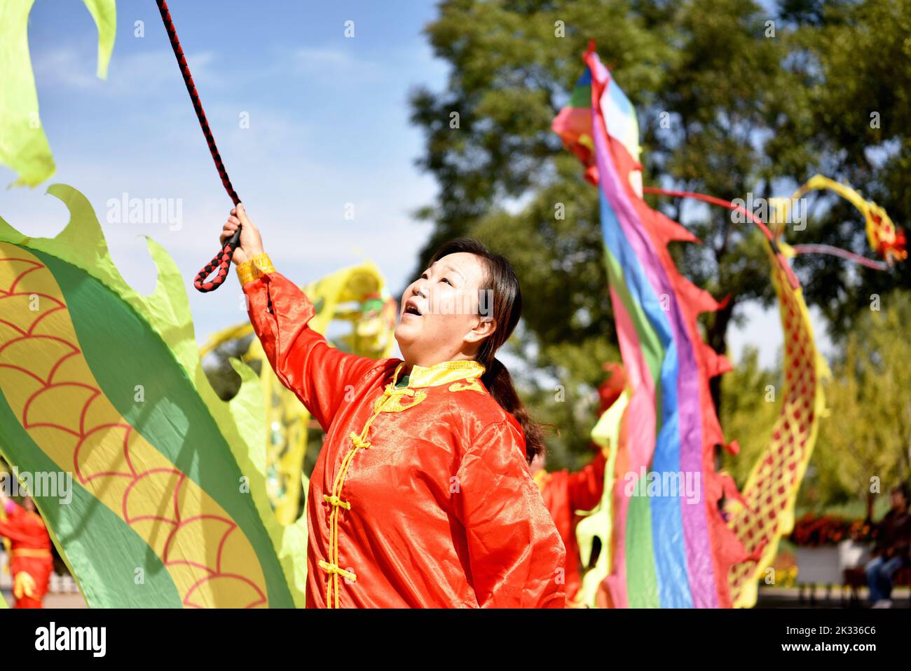 ZHANGJIAKOU, CHINA - SEPTEMBER 24, 2022 - Dragon dance lovers perform ...