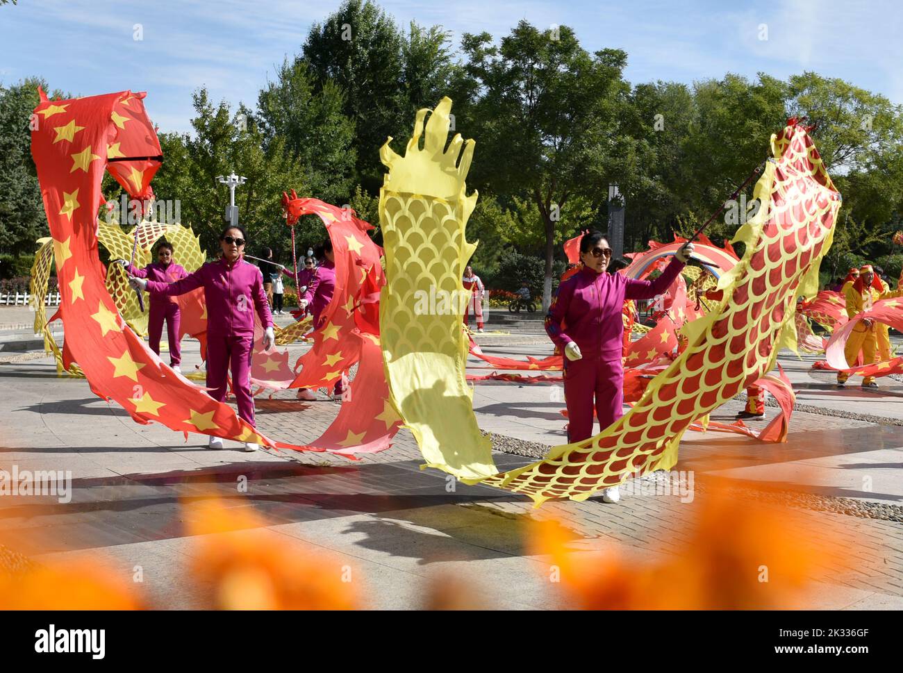 ZHANGJIAKOU, CHINA - SEPTEMBER 24, 2022 - Dragon dance lovers perform ...