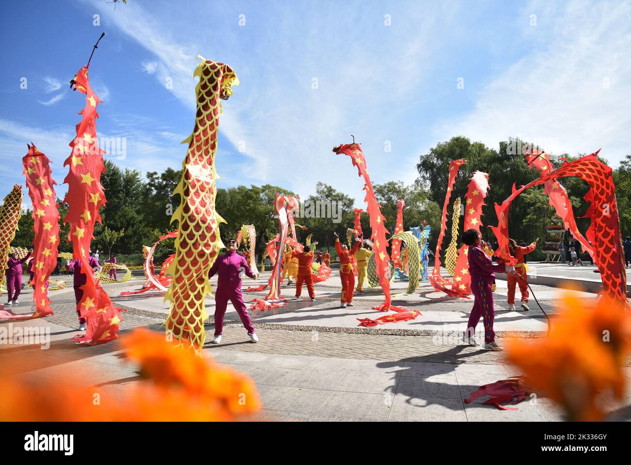 ZHANGJIAKOU, CHINA - SEPTEMBER 24, 2022 - Dragon dance lovers perform ...