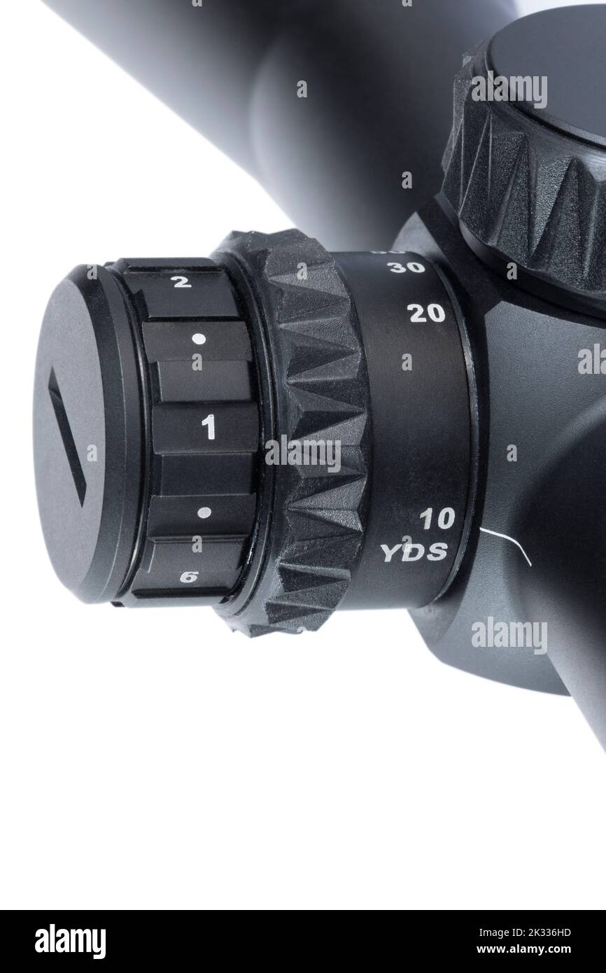 Reticle brightness and parallax controls on a riflescope on white Stock ...