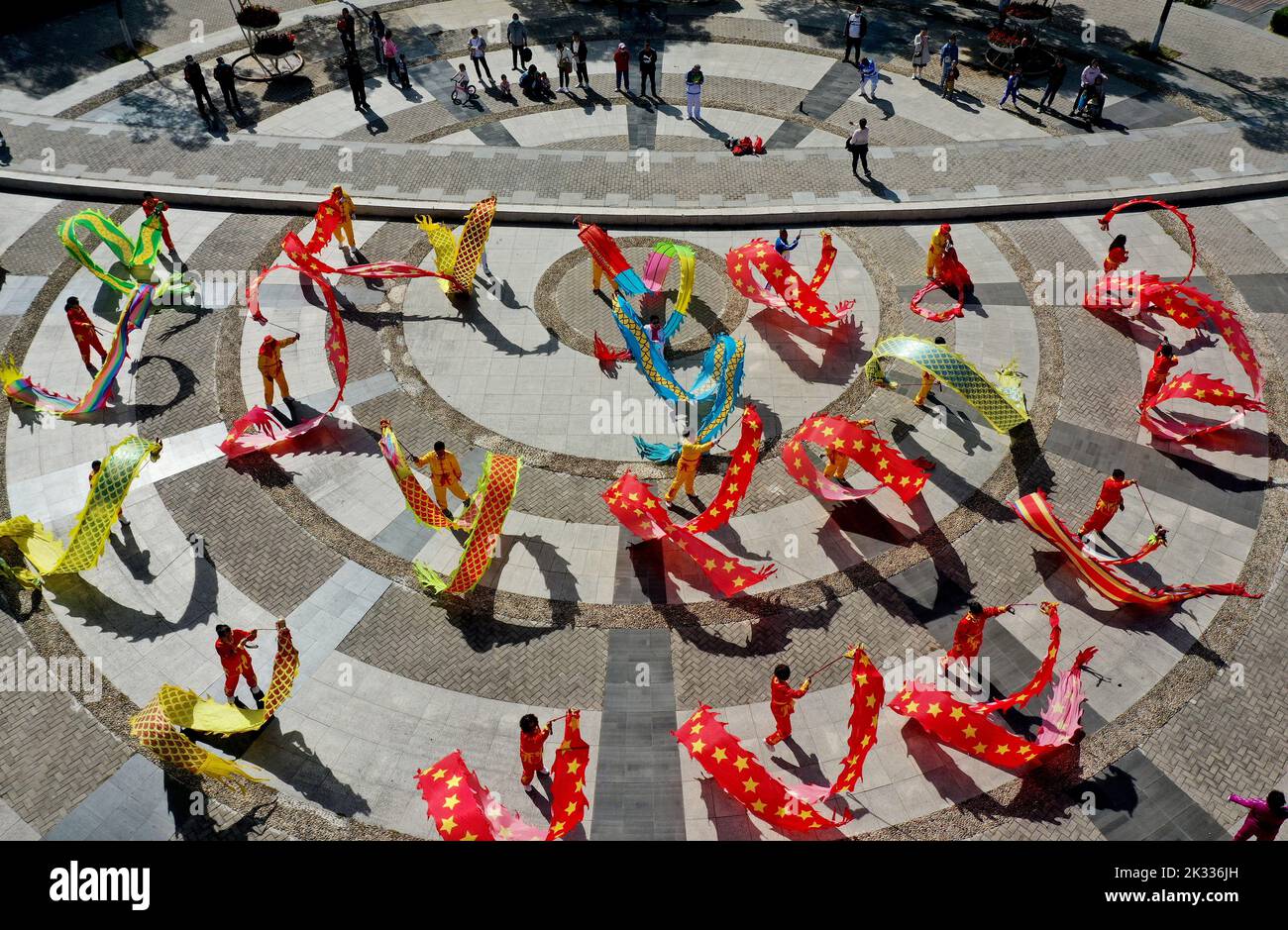 ZHANGJIAKOU, CHINA - SEPTEMBER 24, 2022 - Dragon dance lovers perform ...