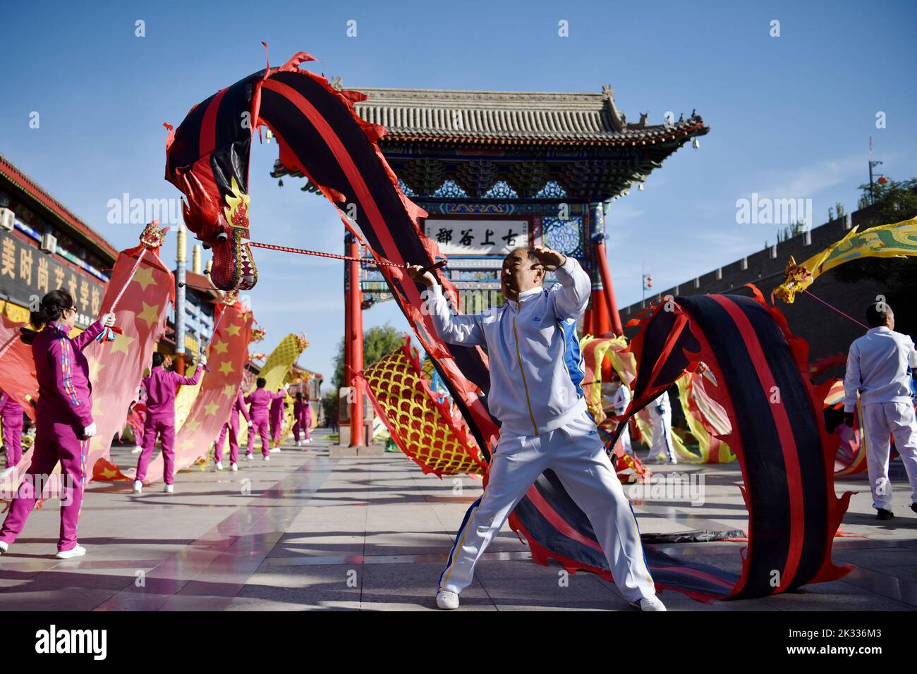 ZHANGJIAKOU, CHINA - SEPTEMBER 24, 2022 - Dragon dance lovers perform ...