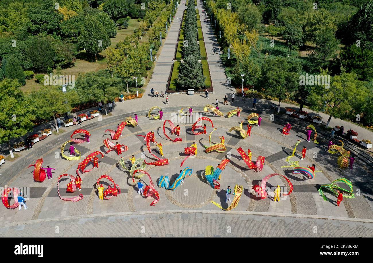 ZHANGJIAKOU, CHINA - SEPTEMBER 24, 2022 - Dragon dance lovers perform ...