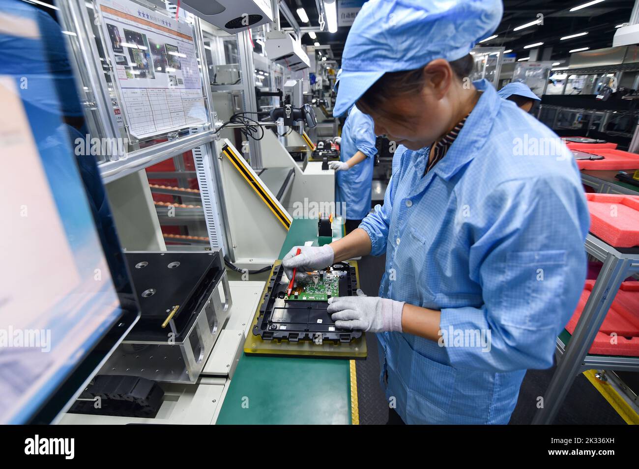SUQIAN, CHINA - SEPTEMBER 23, 2022 - Workers assemble and produce a ...