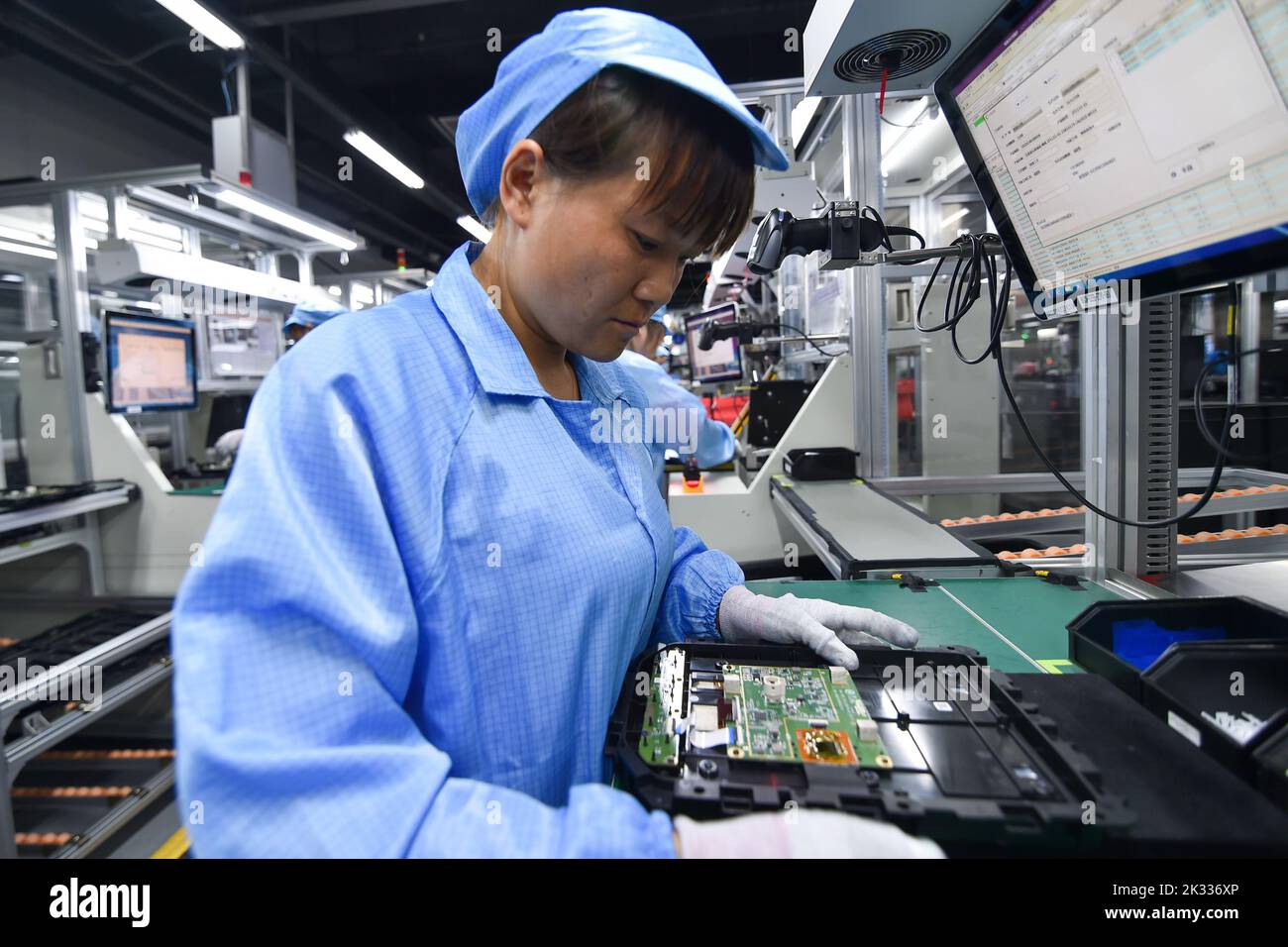 SUQIAN, CHINA - SEPTEMBER 23, 2022 - Workers assemble and produce a ...