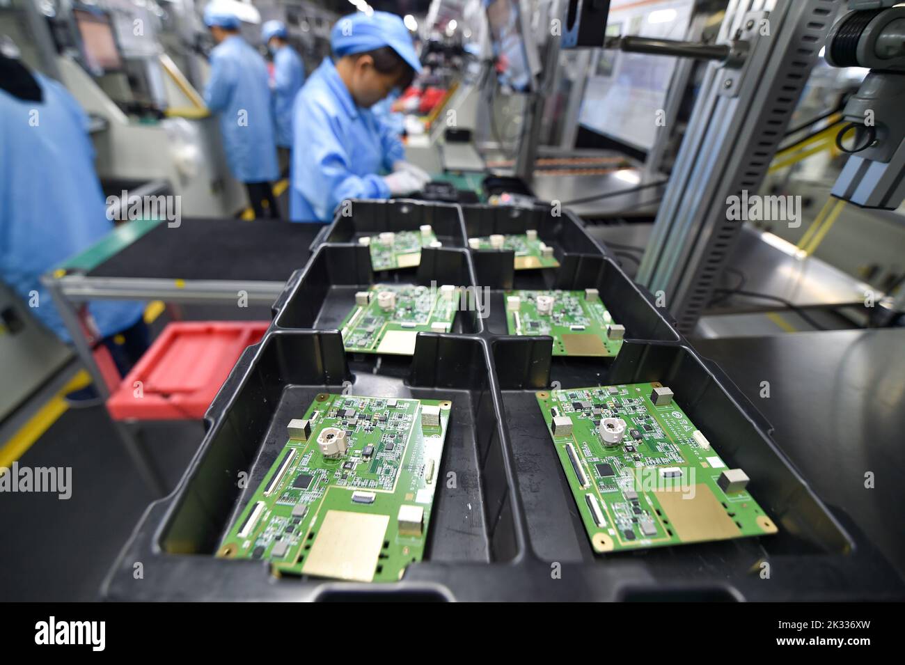 SUQIAN, CHINA - SEPTEMBER 23, 2022 - Workers assemble and produce a ...