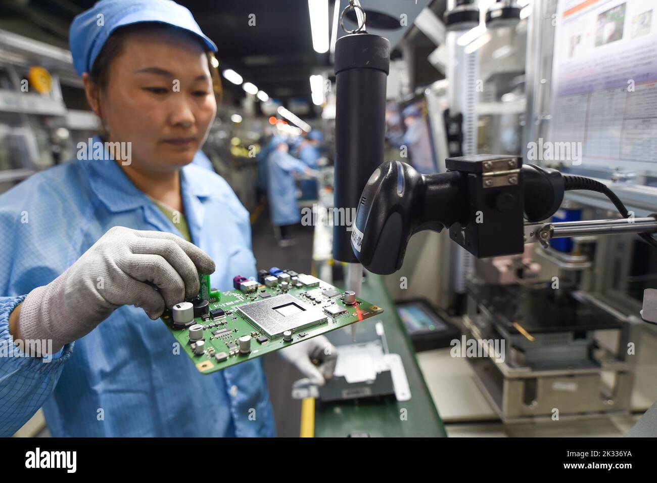 SUQIAN, CHINA - SEPTEMBER 23, 2022 - Workers assemble and produce a ...