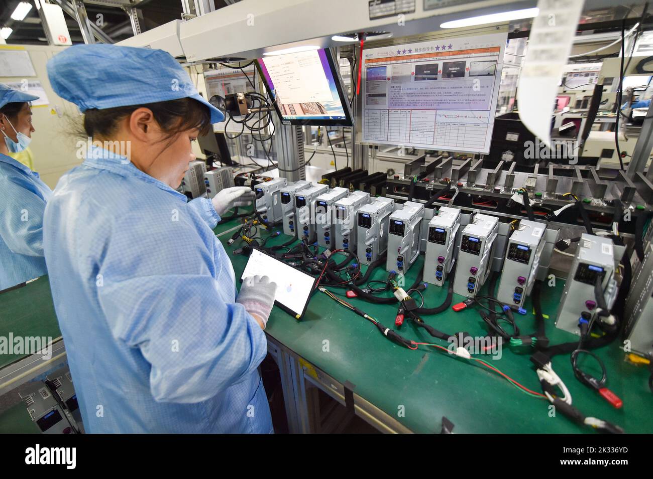 SUQIAN, CHINA - SEPTEMBER 23, 2022 - Workers assemble and produce a ...