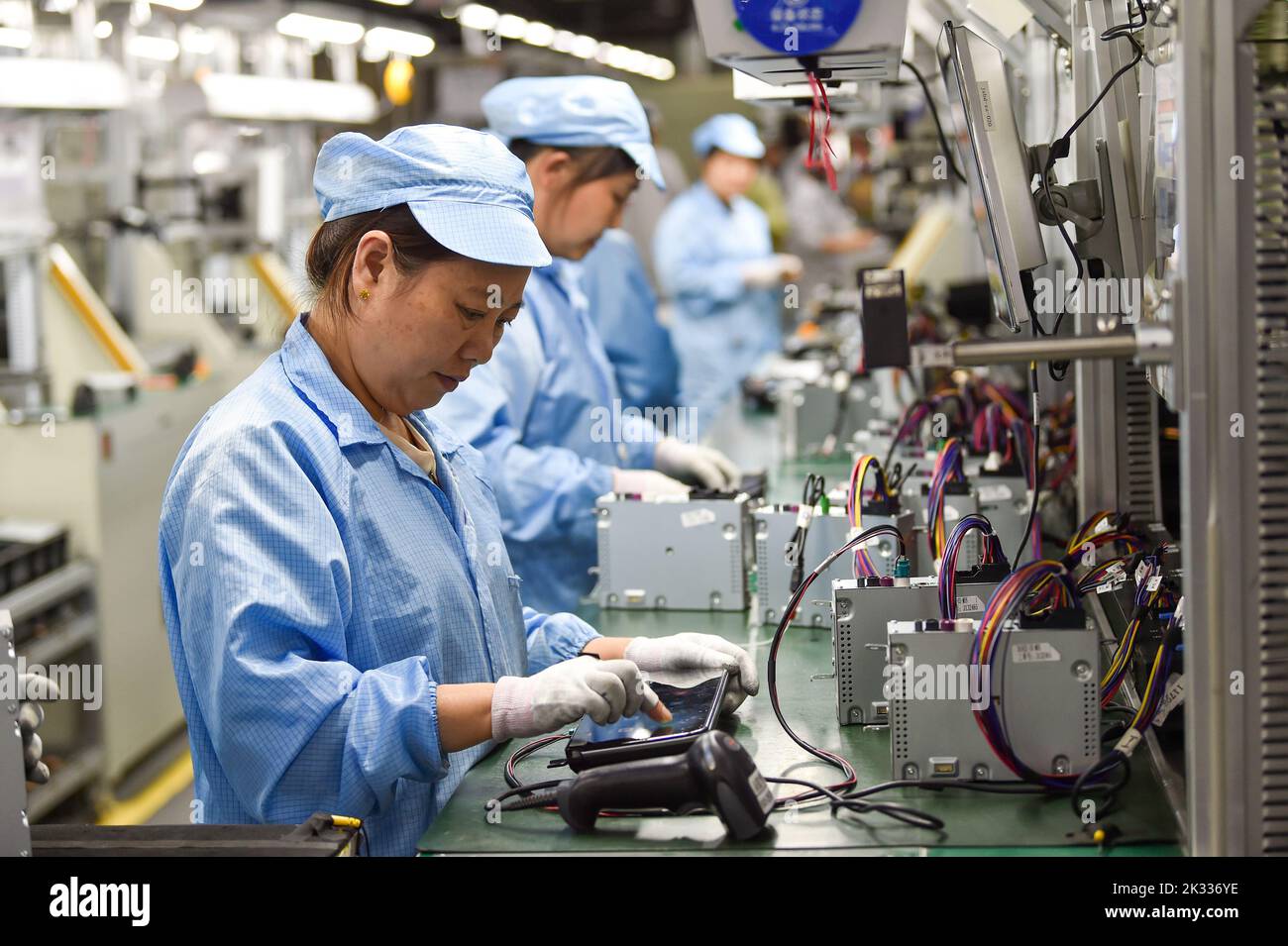 SUQIAN, CHINA - SEPTEMBER 23, 2022 - Workers assemble and produce a vehicle intelligent central ...