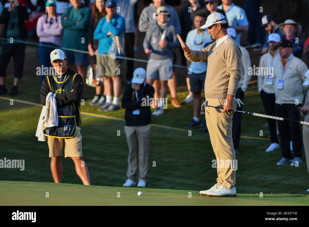 September 24, 2022: Adam Scott reading a putt during the Presidents Cup ...