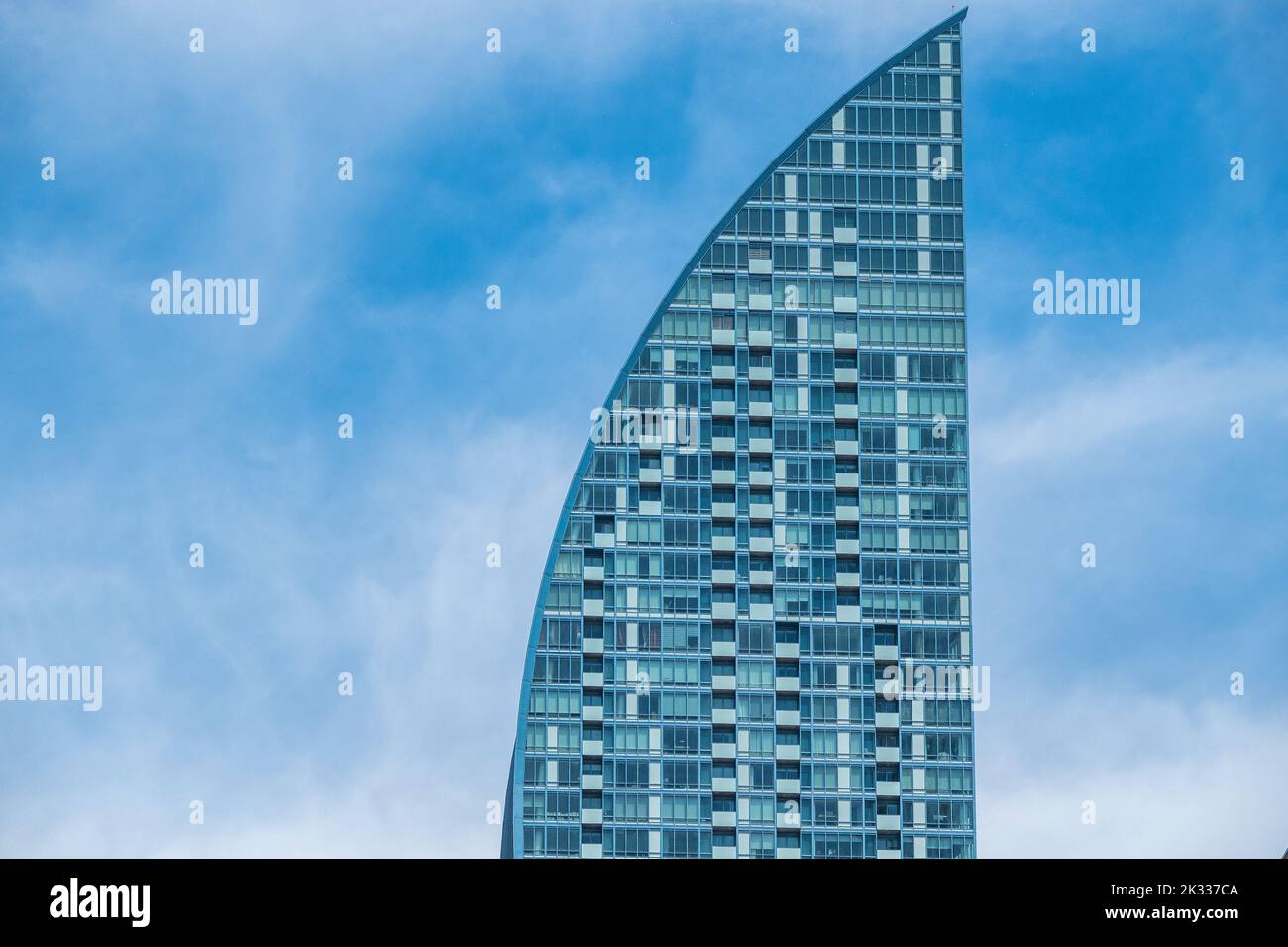 A partial view of the L Tower against blue cloudy sky Stock Photo - Alamy