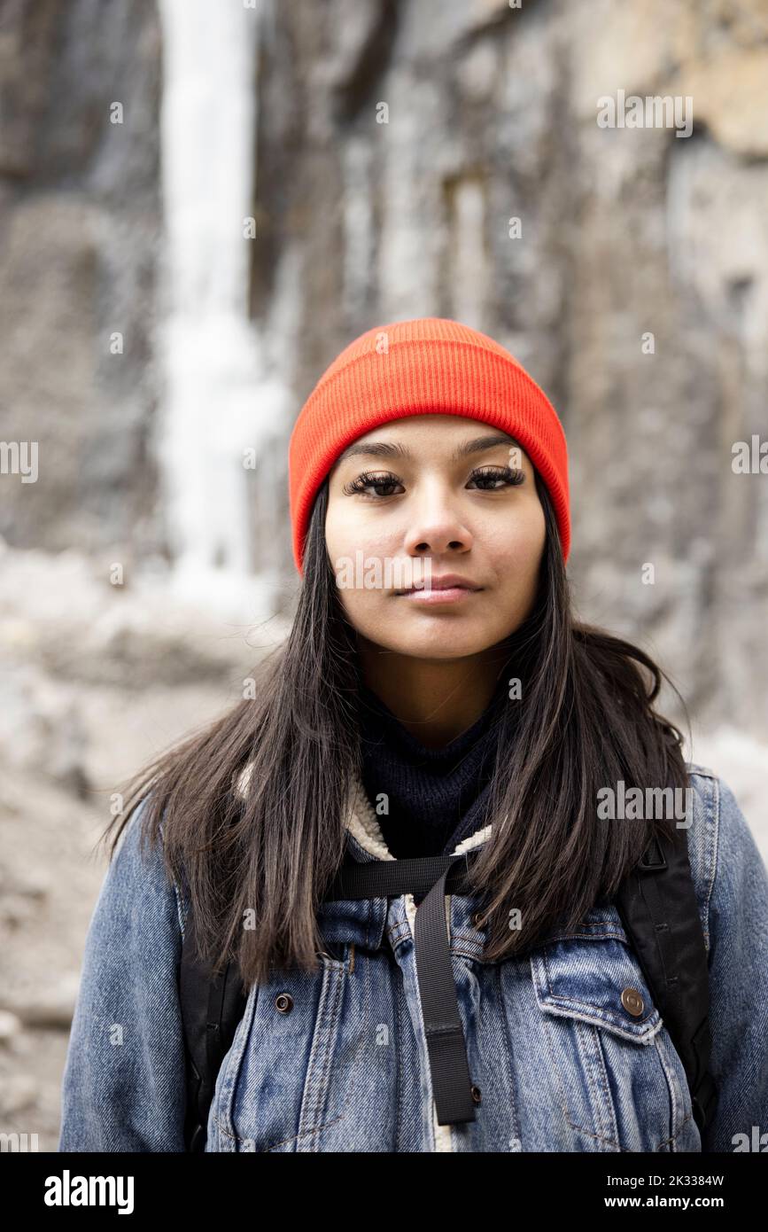 Woman next to waterfall hi-res stock photography and images - Alamy