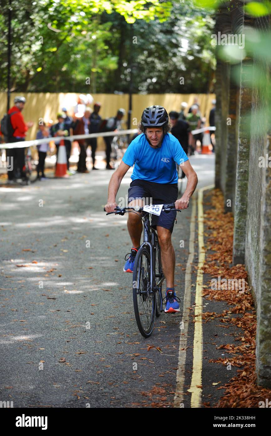 Henry Yates (rider No. 248) straining as they race up Swains Lane in ...