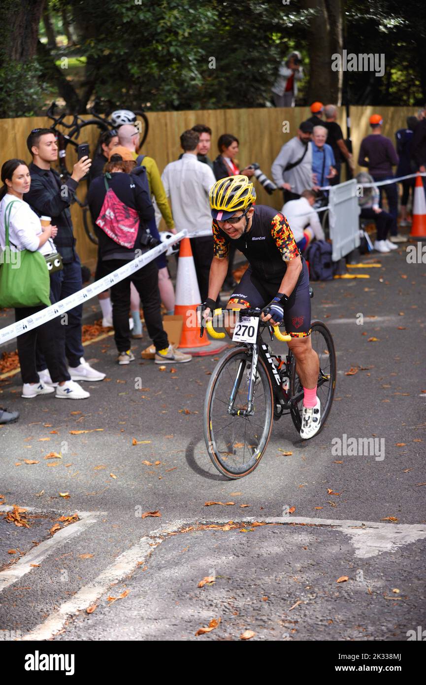 Tetsuo Nomoto (rider No. 270) straining as they race up Swains Lane in ...