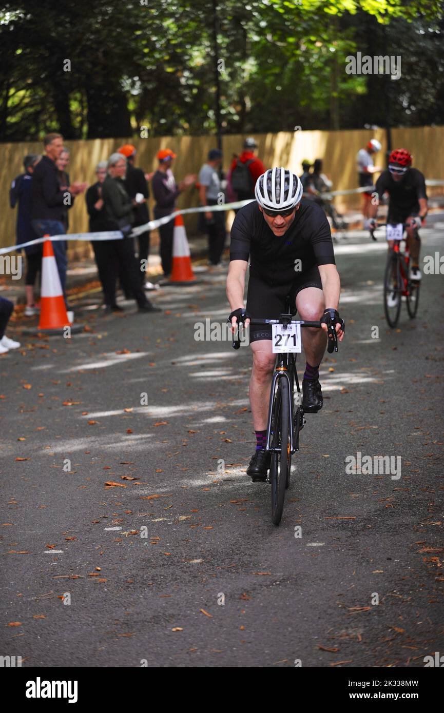 Owen Singleton (rider No. 271) straining as they race up Swains Lane in ...
