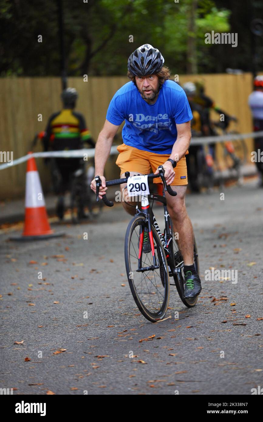 Steve Holding (rider No. 290) straining as they race up Swains Lane in ...