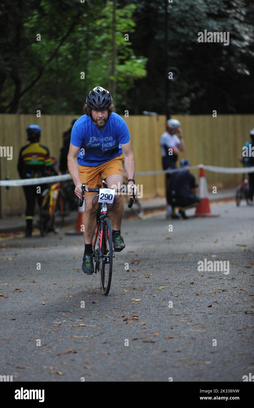 Steve Holding (rider No. 290) straining as they race up Swains Lane in ...