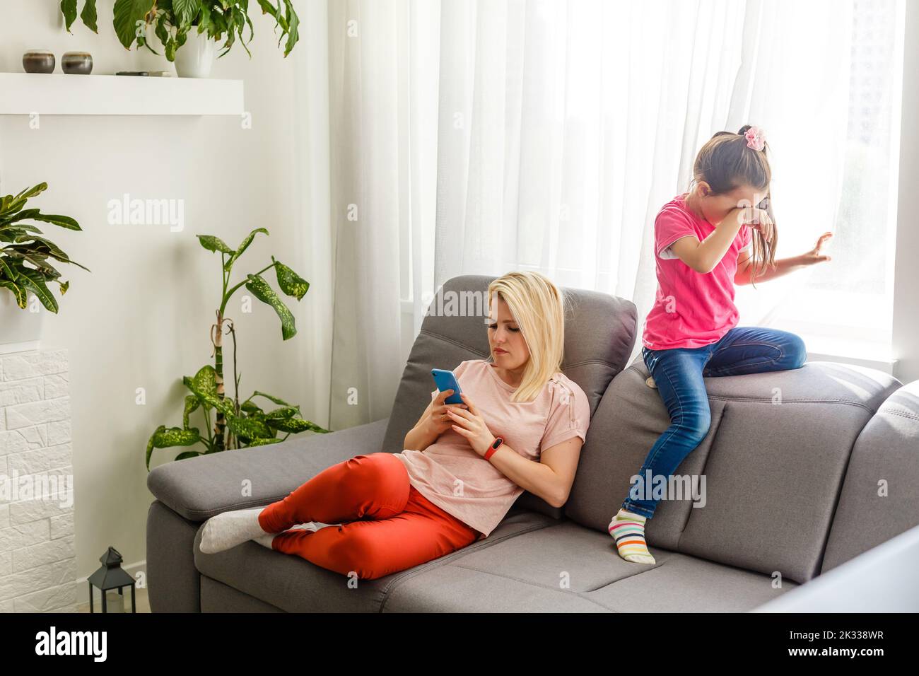 Teenage daughter comforting her mother hi-res stock photography and images - Alamy