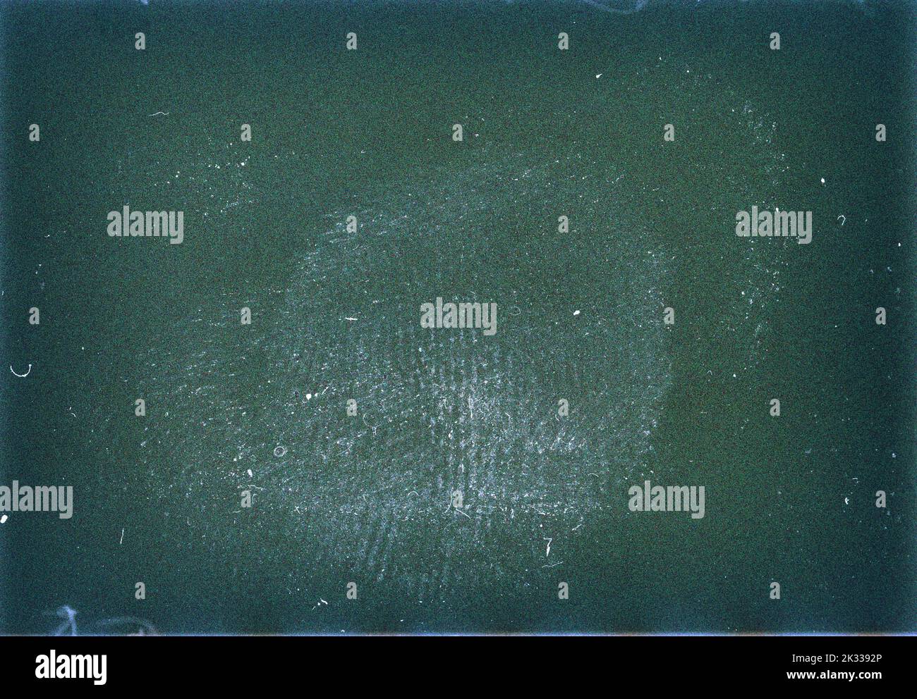 Blank grained toned film strip texture background with heavy grain ...