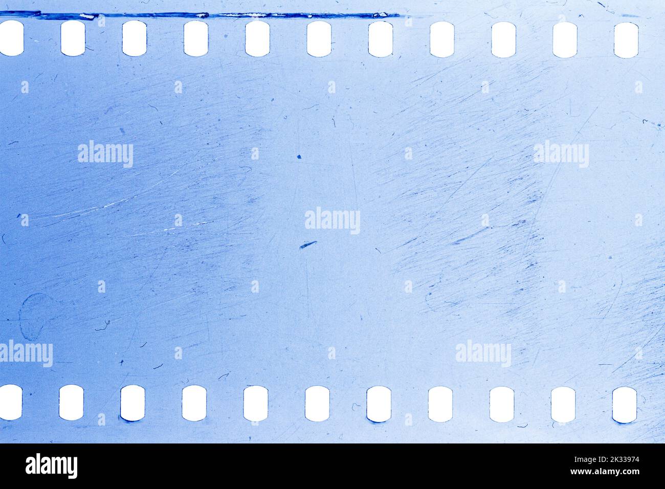 Dusty and grungy 35mm film texture or surface. Perforated scratched ...